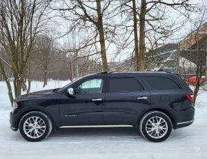 Black Dodge Durango 2014 in Siauliai, with an engine capacity of 3.60 L and mileage of 290 thousand km for 13900 €, photo 14 on AUTOMOTO.COM.LV