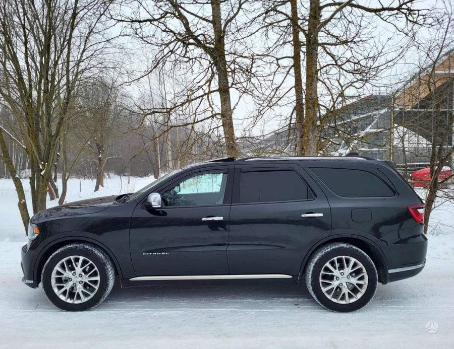 Black Dodge Durango 2014 in Siauliai, with an engine capacity of 3.60 L and mileage of 290 thousand km for 13900 €, photo 14 on AUTOMOTO.COM.LV