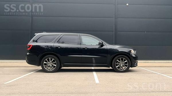 Black Dodge Durango 2014 in Riga, with an engine capacity of 3.60 L and mileage of 280 thousand km for 16000 €, photo 4 on AUTOMOTO.COM.LV