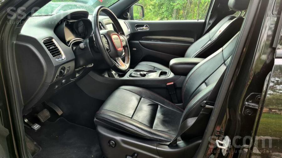 Black Dodge Durango 2014 in Riga, with an engine capacity of 3.60 L and mileage of 280 thousand km for 16000 €, photo 12 on AUTOMOTO.COM.LV