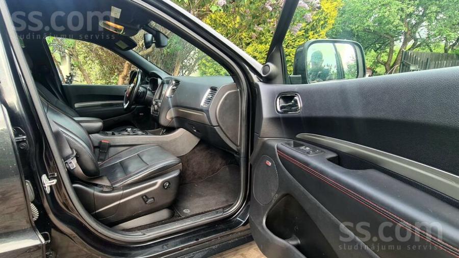 Black Dodge Durango 2014 in Riga, with an engine capacity of 3.60 L and mileage of 280 thousand km for 16000 €, photo 13 on AUTOMOTO.COM.LV