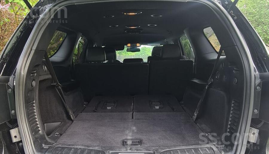 Black Dodge Durango 2014 in Riga, with an engine capacity of 3.60 L and mileage of 280 thousand km for 16000 €, photo 16 on AUTOMOTO.COM.LV
