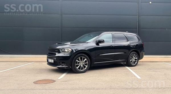 Black Dodge Durango 2014 in Riga, with an engine capacity of 3.60 L and mileage of 280 thousand km for 15000 €, photo 1 on AUTOMOTO.COM.LV