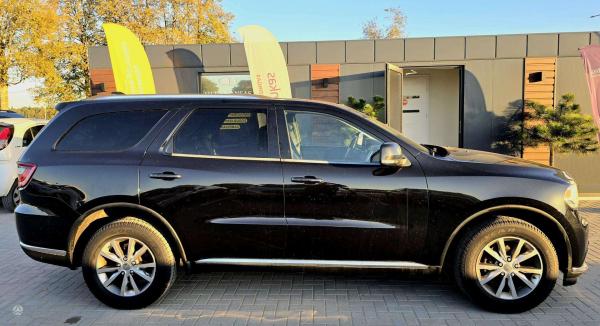 Dodge Durango 2014 Tauragė vietnē Melns Dodge Durango 2014 Tauragė, ar dzinēja tilpumu 3.60 L un nobraukumu 201 tūkst. km par 12500 €, foto 7 vietnē AUTOMOTO.COM.LV