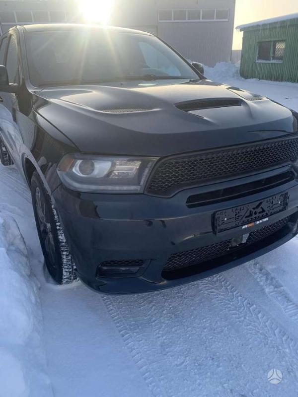 Black Dodge Durango 2015 in Klaipeda, with an engine capacity of 5.65 L and mileage of 245 thousand km for 15590 €, photo 1 on AUTOMOTO.COM.LV