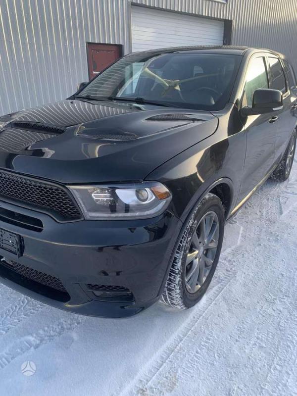 Black Dodge Durango 2015 in Klaipeda, with an engine capacity of 5.65 L and mileage of 245 thousand km for 15590 €, photo 2 on AUTOMOTO.COM.LV