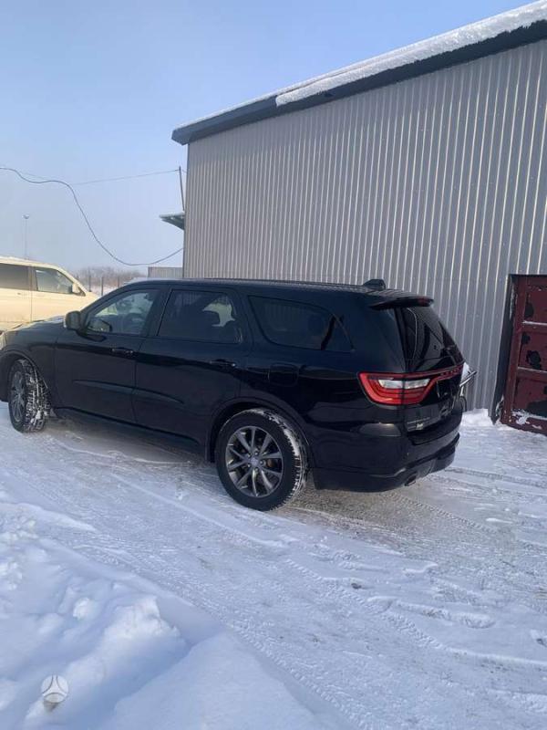 Black Dodge Durango 2015 in Klaipeda, with an engine capacity of 5.65 L and mileage of 245 thousand km for 15590 €, photo 3 on AUTOMOTO.COM.LV