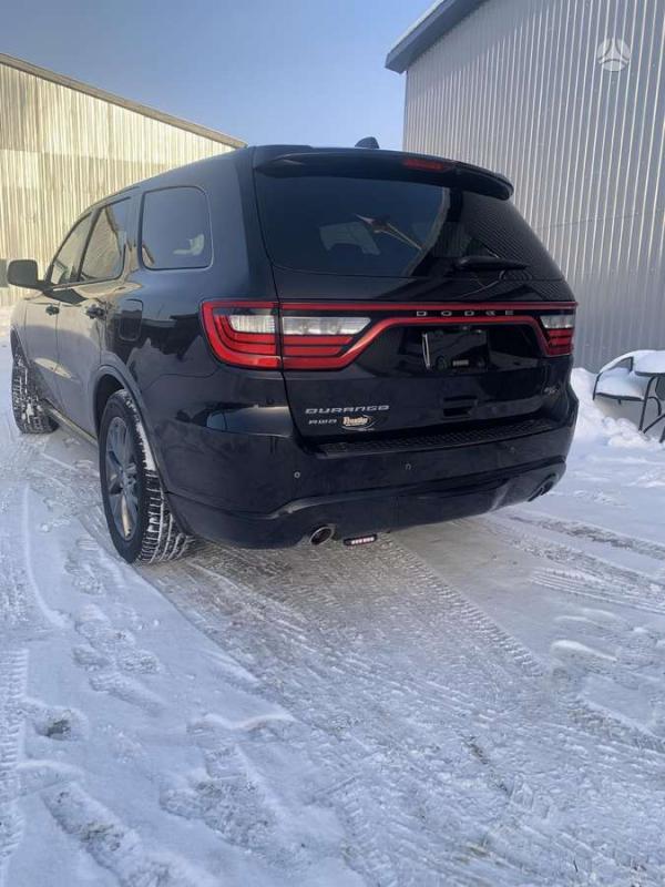 Black Dodge Durango 2015 in Klaipeda, with an engine capacity of 5.65 L and mileage of 245 thousand km for 15590 €, photo 6 on AUTOMOTO.COM.LV