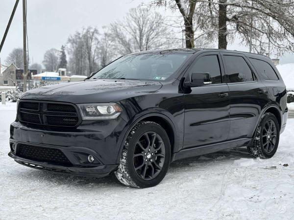 Black Dodge Durango 2015 in Ukmerge, with an engine capacity of 5.65 L and mileage of 170 thousand km for 9900 €, photo 1 on AUTOMOTO.COM.LV