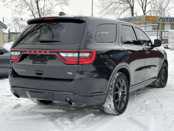 Black Dodge Durango 2015 in Ukmerge, with an engine capacity of 5.65 L and mileage of 170 thousand km for 9900 €, photo 7 on AUTOMOTO.COM.LV