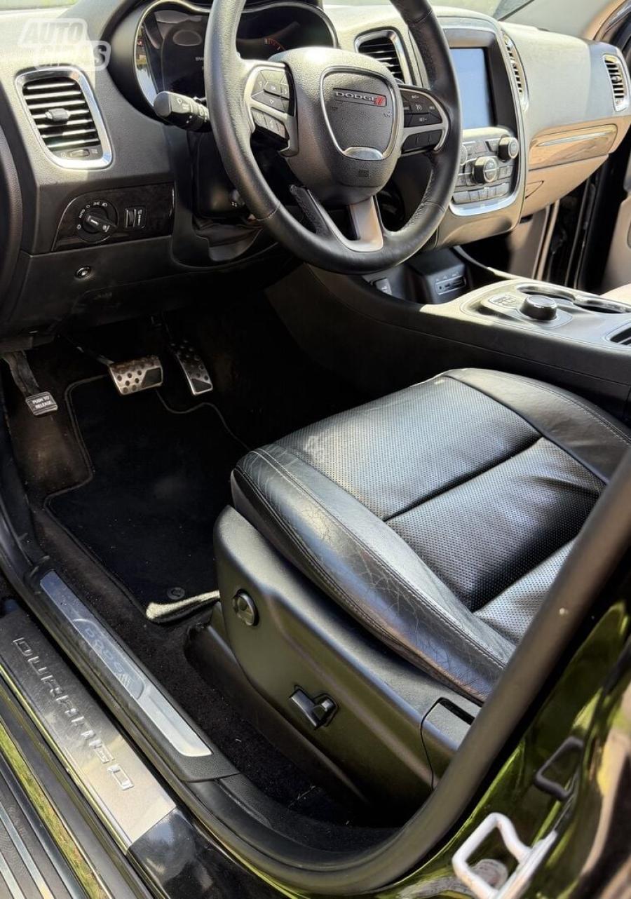 Black Dodge Durango 2015 in Gargzdai, with an engine capacity of 3.60 L and mileage of 169 thousand km for 15700 €, photo 6 on AUTOMOTO.COM.LV