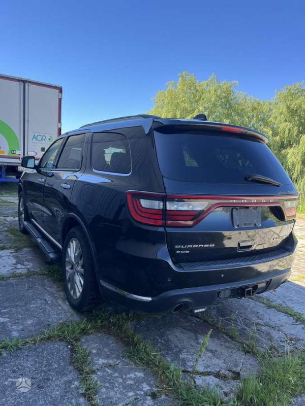 Black Dodge Durango 2015 in Klaipeda, with an engine capacity of 3.60 L and mileage of 275 thousand km for 12900 €, photo 6 on AUTOMOTO.COM.LV