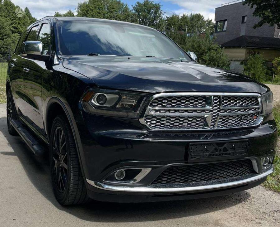 Black Dodge Durango 2015 in Ukmerge, with an engine capacity of 3.60 L and mileage of 276 thousand km for 12500 €, photo 3 on AUTOMOTO.COM.LV