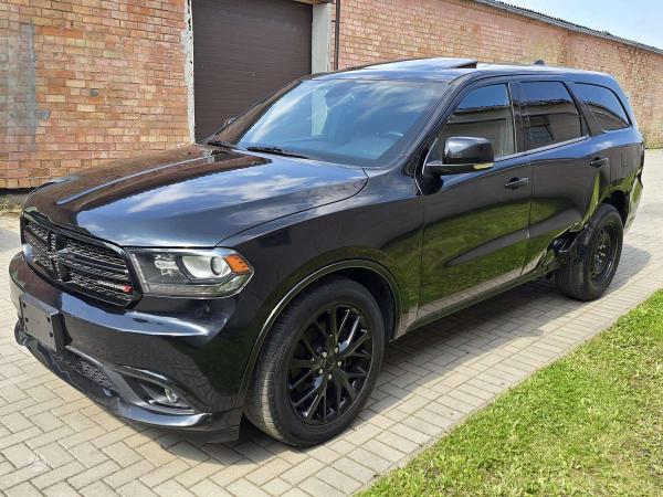 Black Dodge Durango 2015 in Siauliai, with an engine capacity of 5.65 L and mileage of 203 thousand km for 8950 €, photo 1 on AUTOMOTO.COM.LV