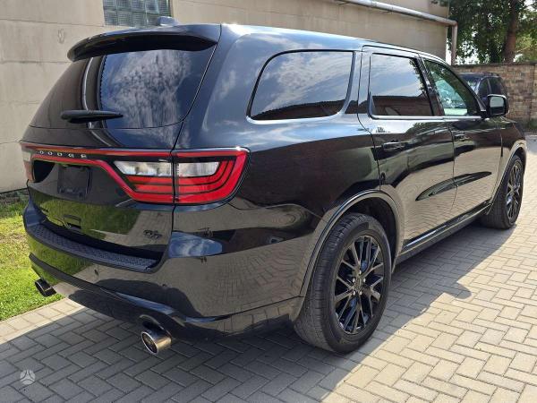 Black Dodge Durango 2015 in Siauliai, with an engine capacity of 5.65 L and mileage of 203 thousand km for 8950 €, photo 3 on AUTOMOTO.COM.LV