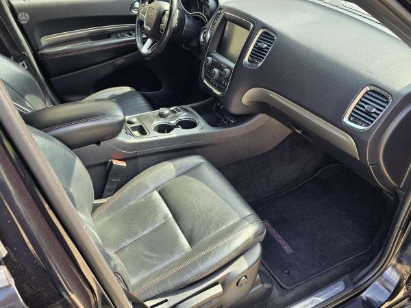 Black Dodge Durango 2015 in Siauliai, with an engine capacity of 5.65 L and mileage of 203 thousand km for 8950 €, photo 8 on AUTOMOTO.COM.LV