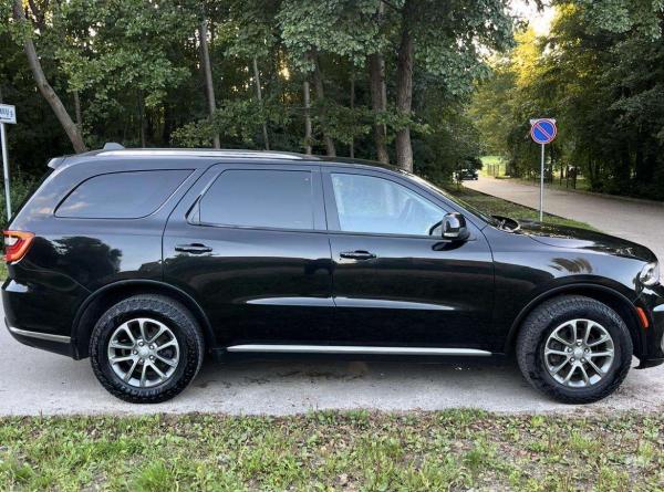 Black Dodge Durango 2015 in Kretinga, with an engine capacity of 3.60 L and mileage of 260 thousand km for 12900 €, photo 5 on AUTOMOTO.COM.LV