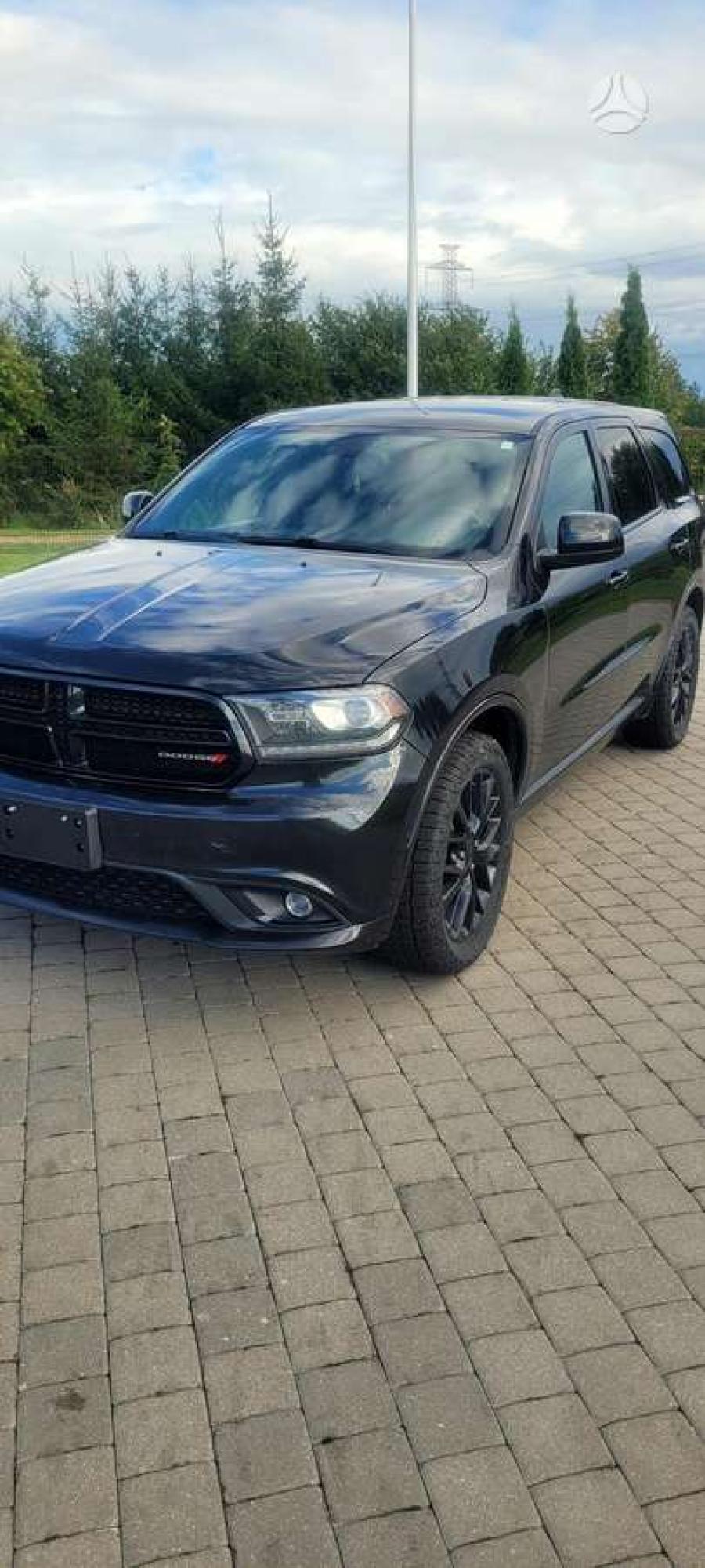 Black Dodge Durango 2015 in Alytus, with an engine capacity of 3.60 L and mileage of 291 thousand km for 8199 €, photo 1 on AUTOMOTO.COM.LV