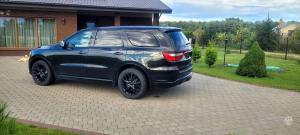 Black Dodge Durango 2015 in Alytus, with an engine capacity of 3.60 L and mileage of 291 thousand km for 8199 €, photo 12 on AUTOMOTO.COM.LV