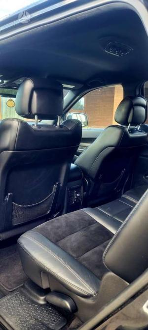 Black Dodge Durango 2015 in Alytus, with an engine capacity of 3.60 L and mileage of 291 thousand km for 8199 €, photo 19 on AUTOMOTO.COM.LV