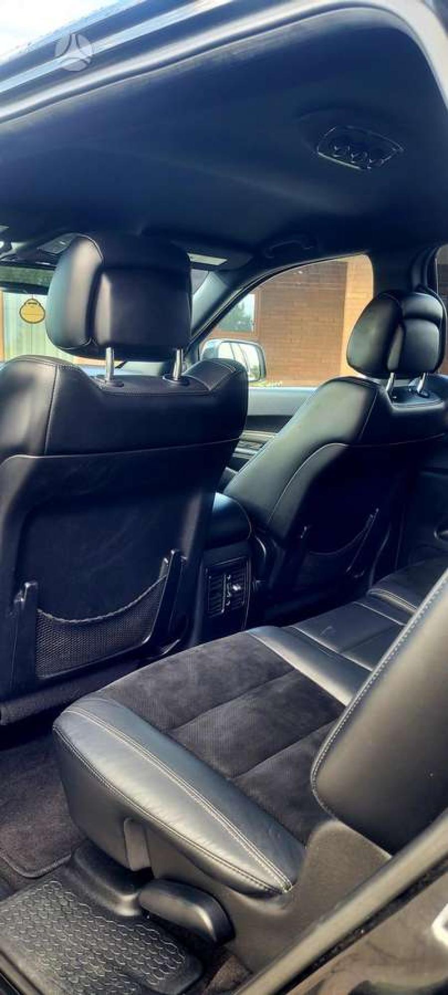 Black Dodge Durango 2015 in Alytus, with an engine capacity of 3.60 L and mileage of 291 thousand km for 8199 €, photo 19 on AUTOMOTO.COM.LV