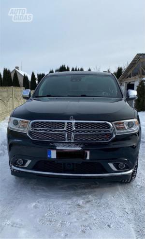Melns Dodge Durango 2017 Viļņa, ar dzinēja tilpumu 5.70 L un nobraukumu 184 tūkst. km par 13999 €, foto  vietnē AUTOMOTO.COM.LV