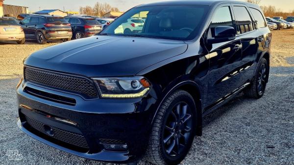 Black Dodge Durango 2017 in Kretinga, with an engine capacity of 5.70 L and mileage of 272 thousand km for 17499 €, photo 1 on AUTOMOTO.COM.LV