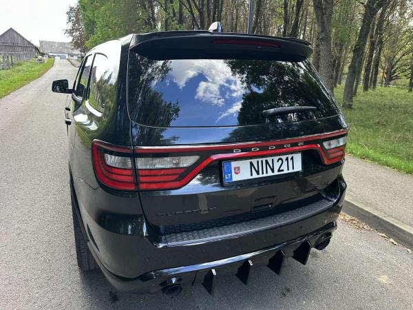 Black Dodge Durango 2017 in Siauliai, with an engine capacity of 5.65 L and mileage of 169 thousand km for 21800 €, photo 6 on AUTOMOTO.COM.LV