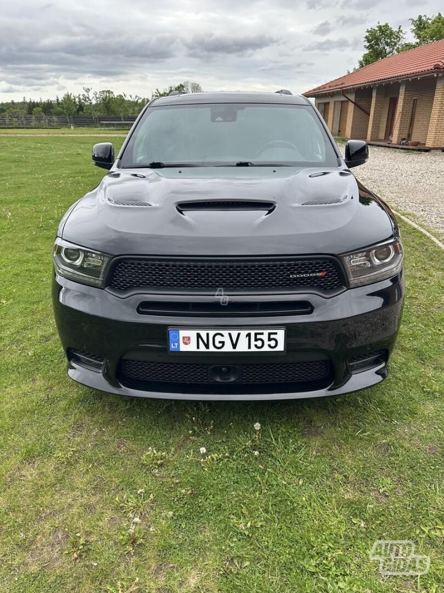 Black Dodge Durango 2018 in Utena, with an engine capacity of 5.70 L and mileage of 107 thousand km for 27700 €, photo 1 on AUTOMOTO.COM.LV