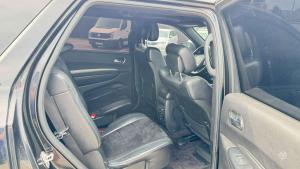 Black Dodge Durango 2018 in Ukmerge, with an engine capacity of 3.60 L and mileage of 365 thousand km for 8999 €, photo 16 on AUTOMOTO.COM.LV