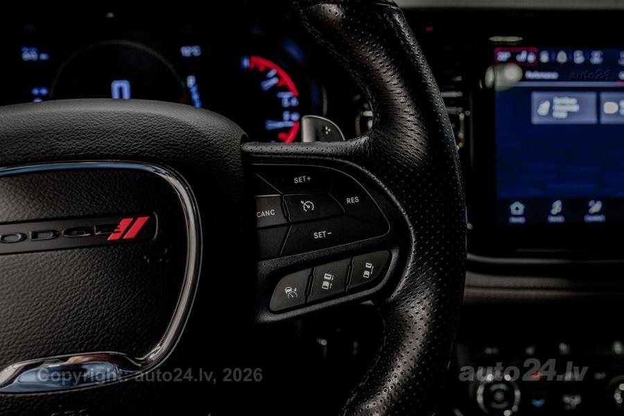 Black Dodge Durango 2023 in Parnu, with an engine capacity of 5.70 L and mileage of 119 thousand km for 48000 €, photo 26 on AUTOMOTO.COM.LV