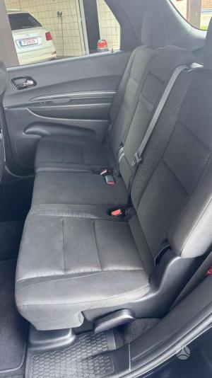 Black Dodge Durango 2023 in Panevezys, with an engine capacity of 3.60 L and mileage of 45 thousand km for 25900 €, photo 13 on AUTOMOTO.COM.LV
