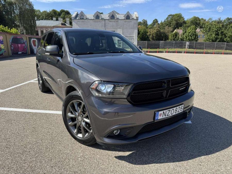 Grey Dodge Durango 2014 in Kedainiai, with an engine capacity of 5.65 L and mileage of 453 thousand km for 7000 €, photo 1 on AUTOMOTO.COM.LV