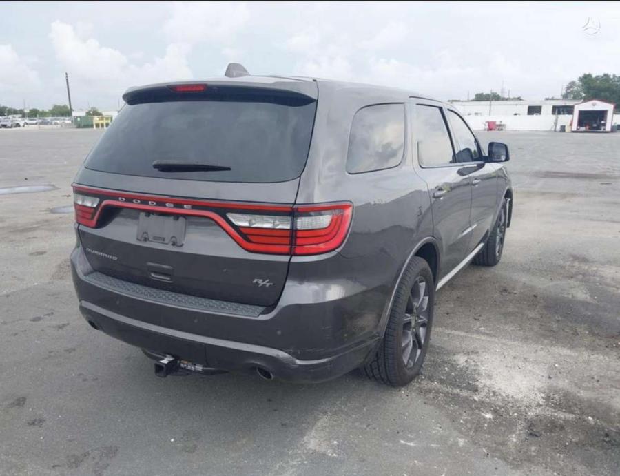 Grey Dodge Durango 2015 in Siauliai, with an engine capacity of 5.65 L and mileage of 267 thousand km for 8700 €, photo 1 on AUTOMOTO.COM.LV