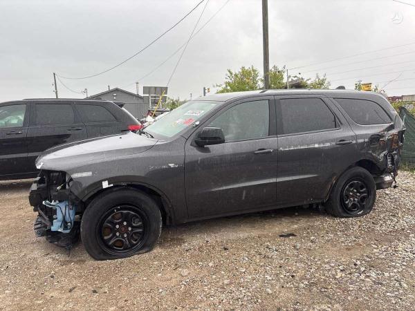 Grey Dodge Durango 2024 in Ukmerge, with an engine capacity of 5.65 L and mileage of 20 thousand km for 15999 €, photo 1 on AUTOMOTO.COM.LV
