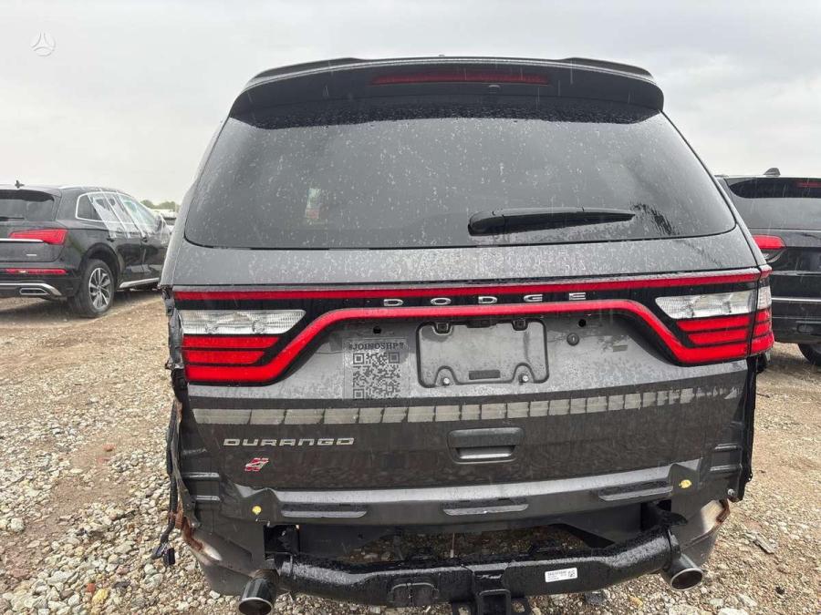Grey Dodge Durango 2024 in Ukmerge, with an engine capacity of 5.65 L and mileage of 20 thousand km for 15999 €, photo 4 on AUTOMOTO.COM.LV