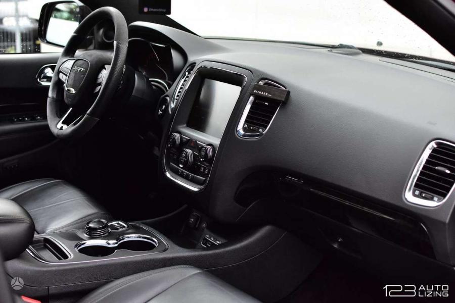 Red Dodge Durango 2014 in Kretinga, with an engine capacity of 3.60 L and mileage of 267 thousand km for 17850 €, photo 3 on AUTOMOTO.COM.LV