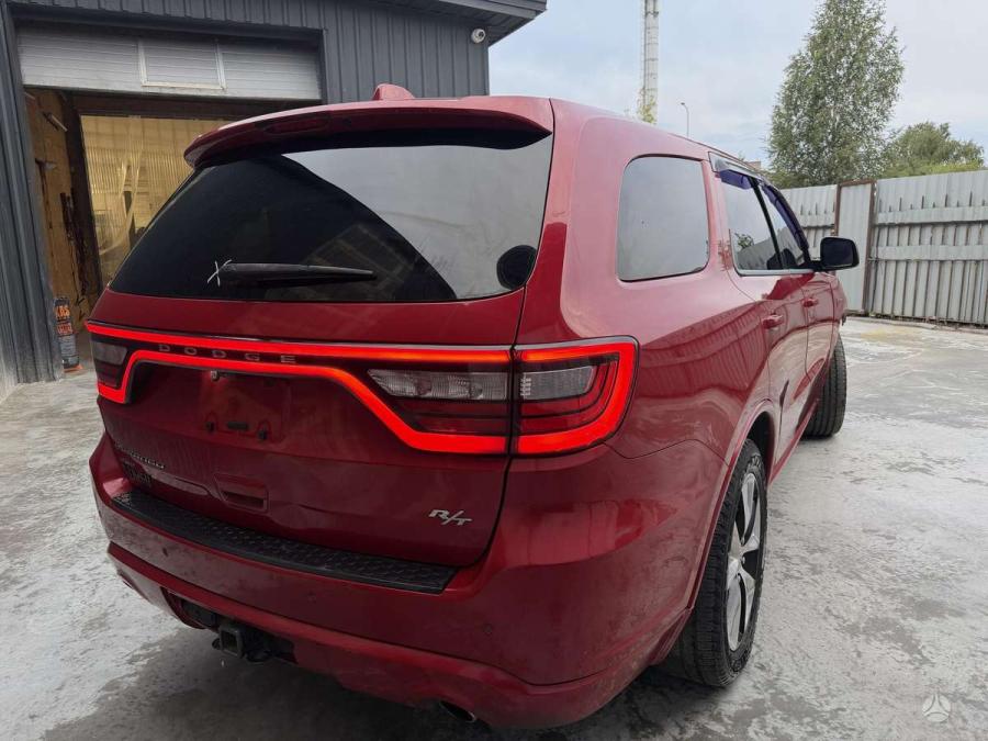 Red Dodge Durango 2015 in Siauliai, with an engine capacity of 5.65 L and mileage of 299 thousand km for 6600 €, photo 5 on AUTOMOTO.COM.LV