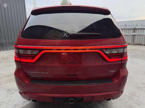 Red Dodge Durango 2015 in Siauliai, with an engine capacity of 5.65 L and mileage of 299 thousand km for 6600 €, photo 5 on AUTOMOTO.COM.LV