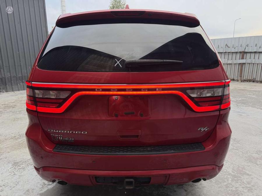 Red Dodge Durango 2015 in Siauliai, with an engine capacity of 5.65 L and mileage of 299 thousand km for 6600 €, photo 6 on AUTOMOTO.COM.LV