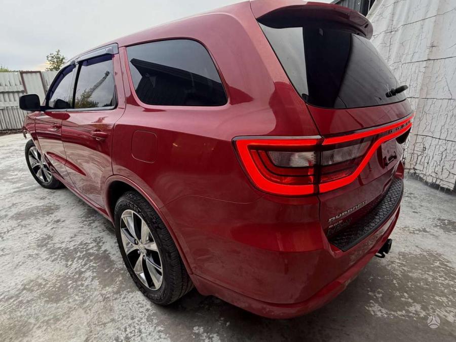 Red Dodge Durango 2015 in Siauliai, with an engine capacity of 5.65 L and mileage of 299 thousand km for 6600 €, photo 7 on AUTOMOTO.COM.LV