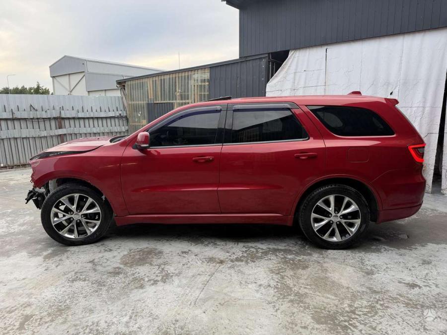 Red Dodge Durango 2015 in Siauliai, with an engine capacity of 5.65 L and mileage of 299 thousand km for 6600 €, photo 8 on AUTOMOTO.COM.LV