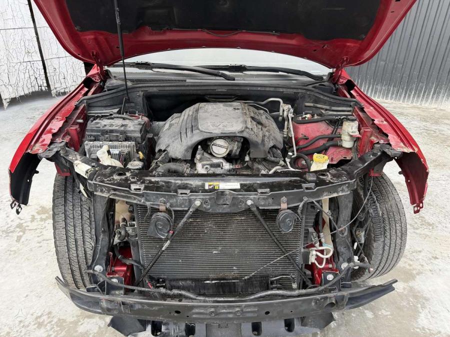 Red Dodge Durango 2015 in Siauliai, with an engine capacity of 5.65 L and mileage of 299 thousand km for 6600 €, photo 11 on AUTOMOTO.COM.LV