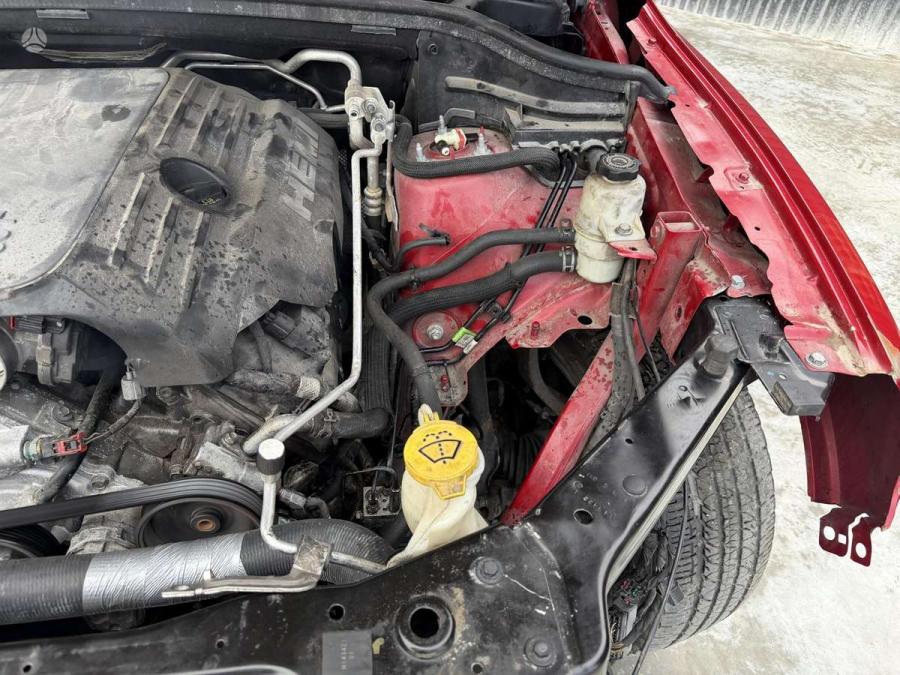 Red Dodge Durango 2015 in Siauliai, with an engine capacity of 5.65 L and mileage of 299 thousand km for 6600 €, photo 13 on AUTOMOTO.COM.LV