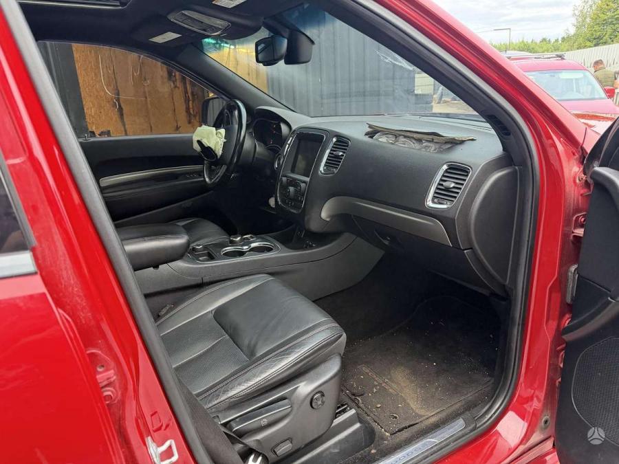 Red Dodge Durango 2015 in Siauliai, with an engine capacity of 5.65 L and mileage of 299 thousand km for 6600 €, photo 16 on AUTOMOTO.COM.LV