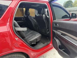 Red Dodge Durango 2015 in Siauliai, with an engine capacity of 5.65 L and mileage of 299 thousand km for 6600 €, photo 18 on AUTOMOTO.COM.LV