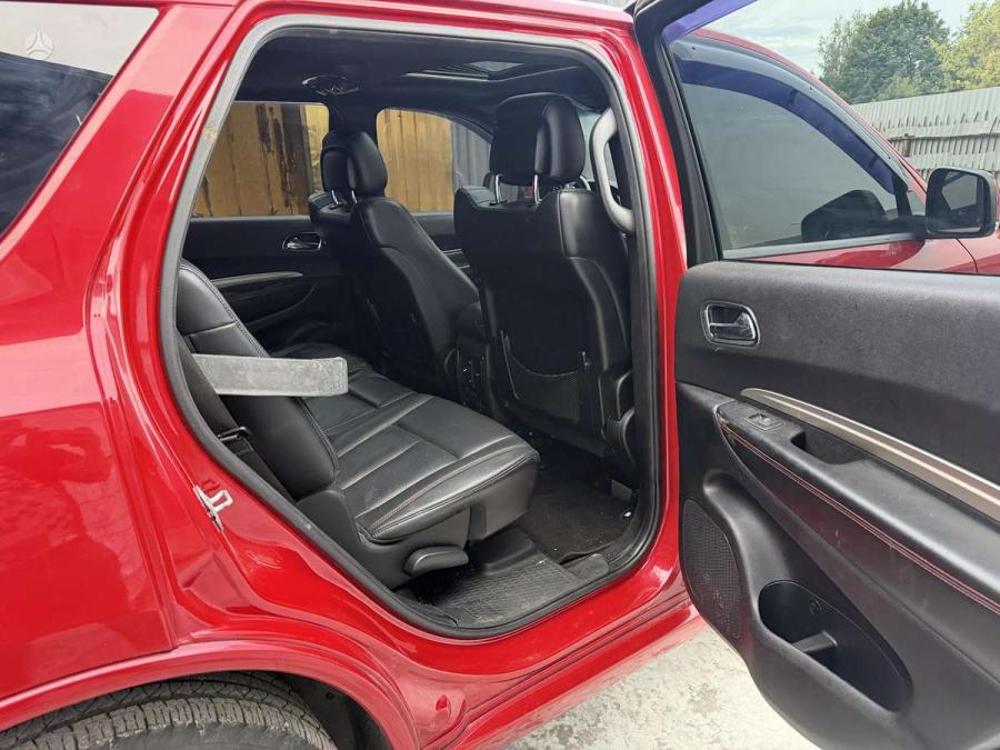Red Dodge Durango 2015 in Siauliai, with an engine capacity of 5.65 L and mileage of 299 thousand km for 6600 €, photo 18 on AUTOMOTO.COM.LV