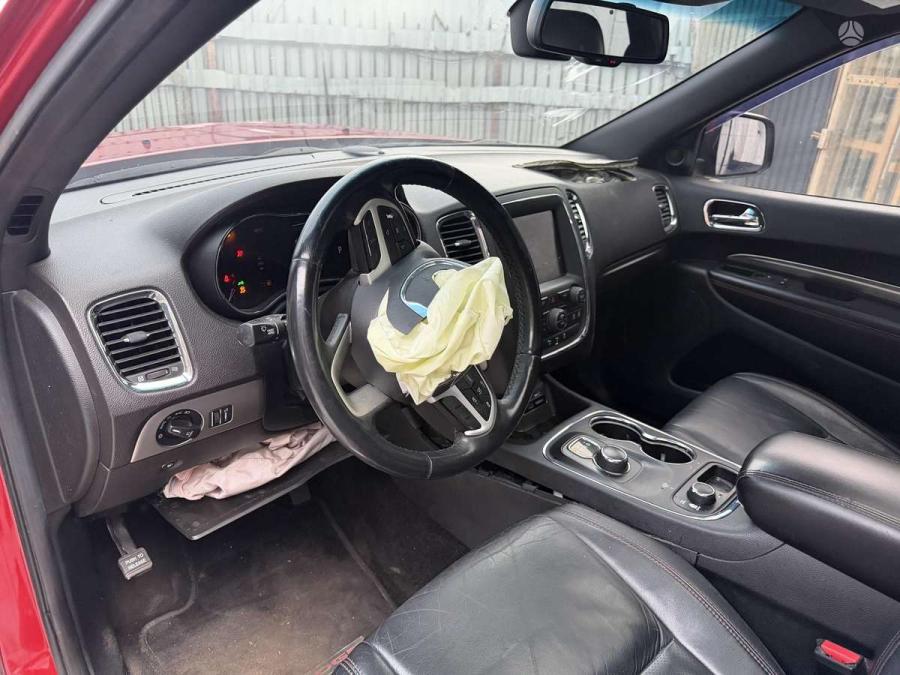 Red Dodge Durango 2015 in Siauliai, with an engine capacity of 5.65 L and mileage of 299 thousand km for 6600 €, photo 25 on AUTOMOTO.COM.LV