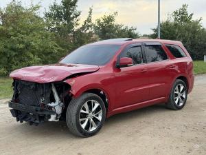 Red Dodge Durango 2015 in Siauliai, with an engine capacity of 5.65 L and mileage of 299 thousand km for 6600 €, photo 29 on AUTOMOTO.COM.LV
