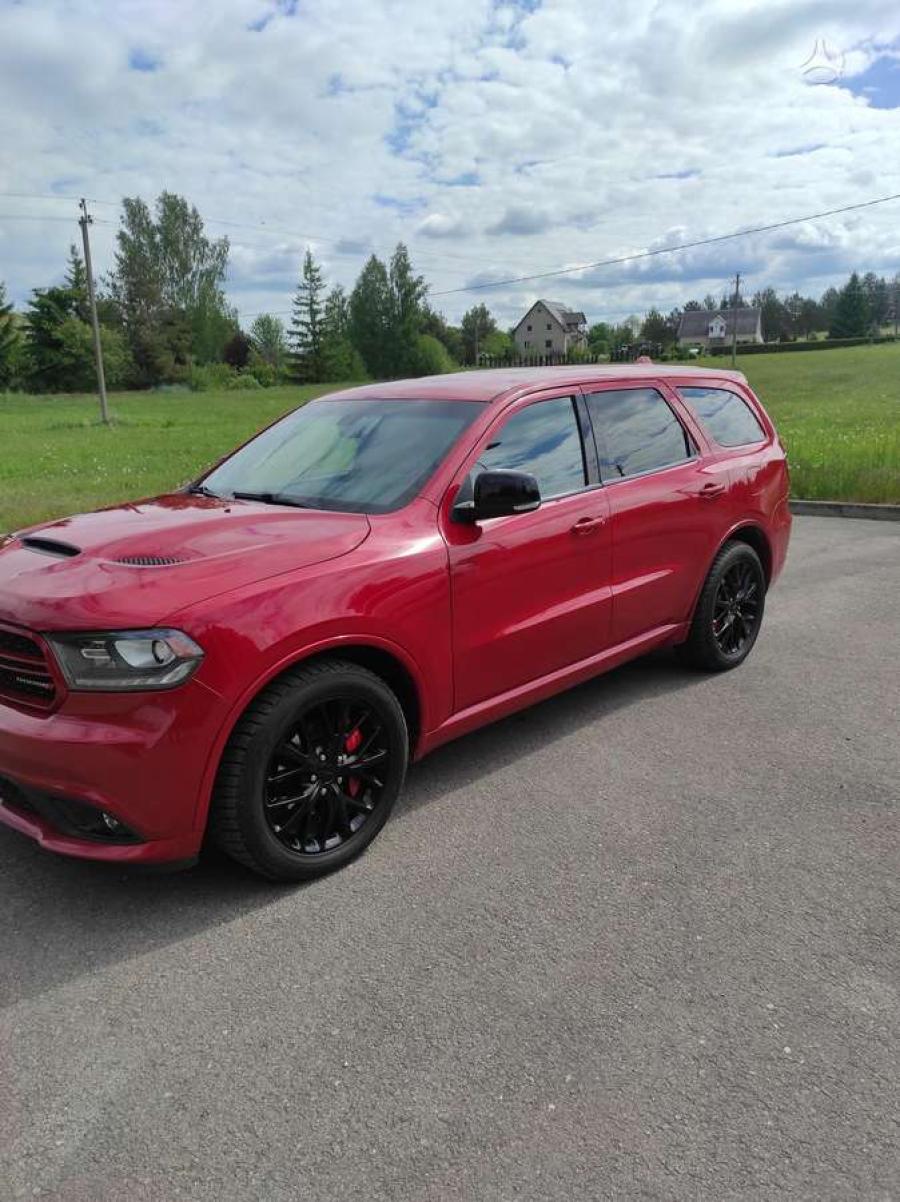 Red Dodge Durango 2015 in Kelme, with an engine capacity of 5.65 L and mileage of 285 thousand km for 15400 €, photo 3 on AUTOMOTO.COM.LV